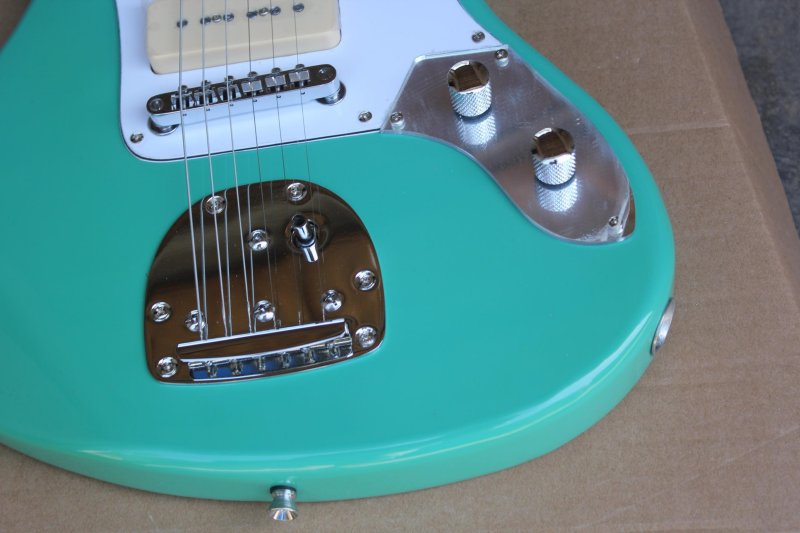 Custom factory seafoam green jaguar electric guitar with P90 pickups